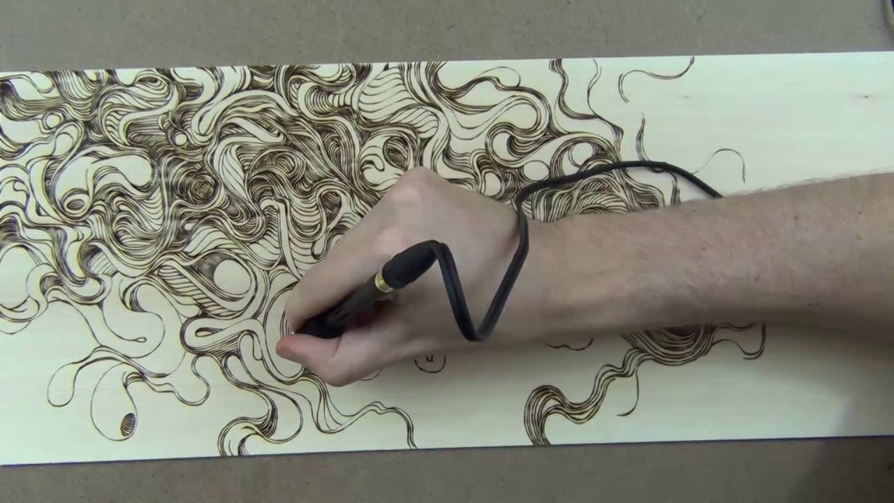 Cool woodburning on a piece of basswood (pyrography, man) - YouTube