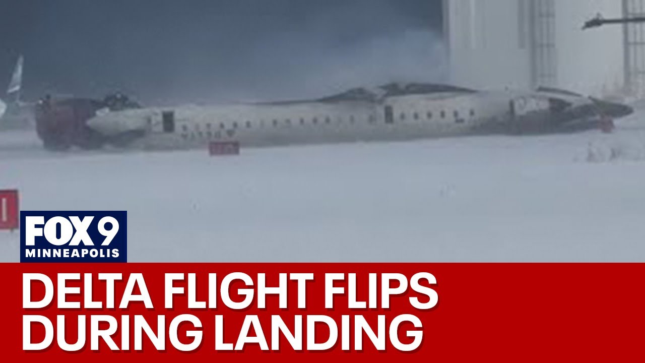 Delta plane flips over during landing in Toronto - YouTube