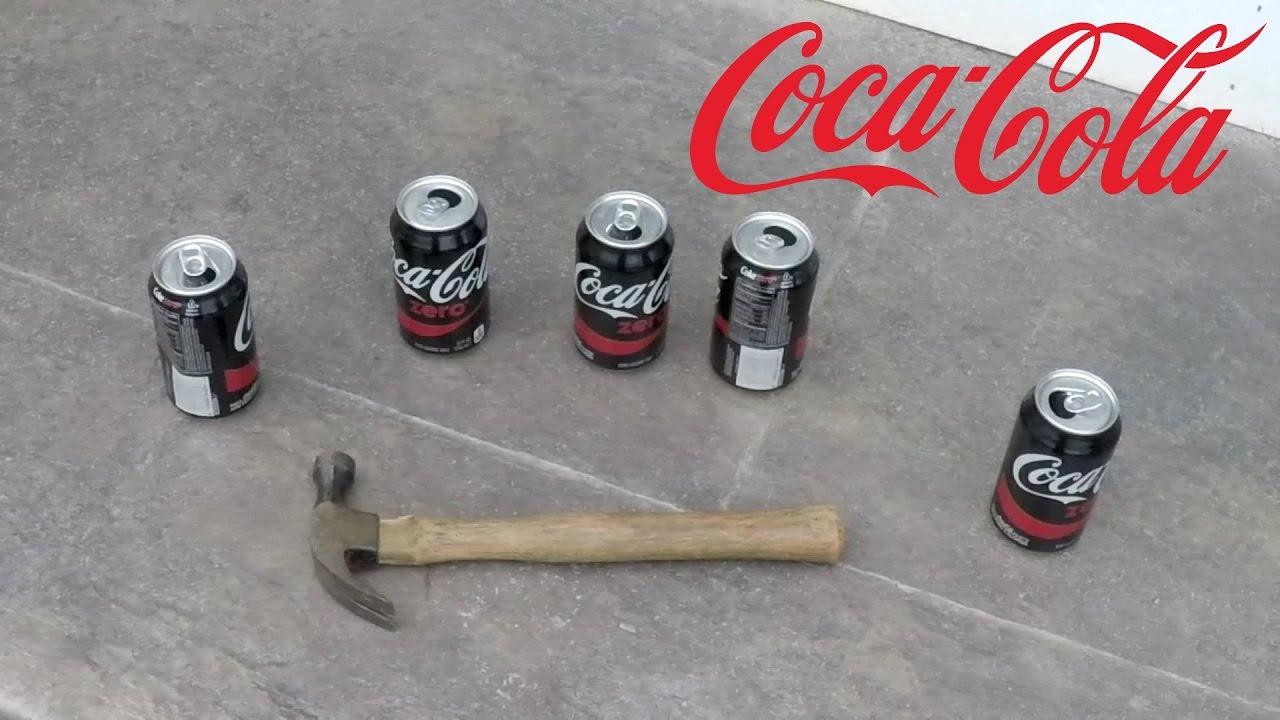 Smashing Coke Cans in Slow Motion - YouTube