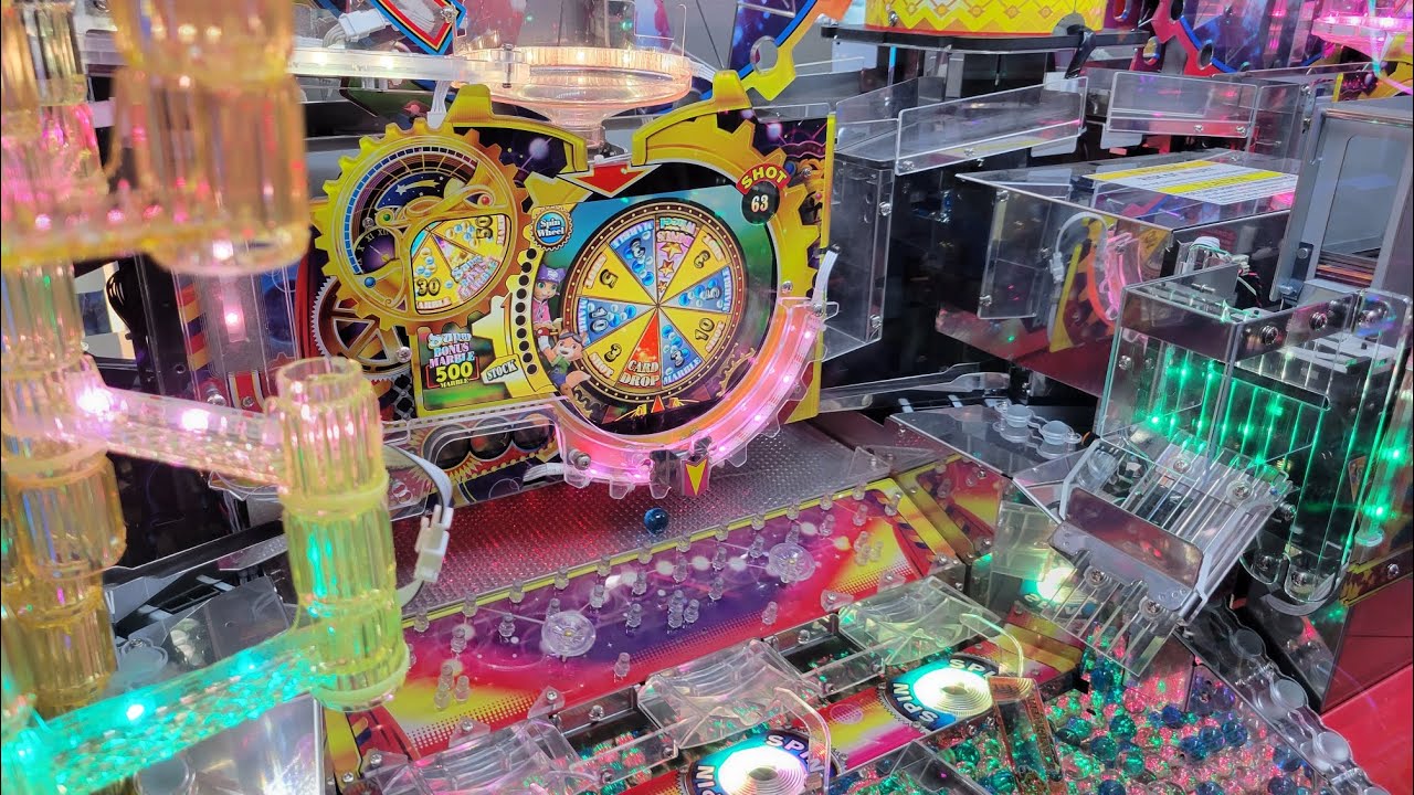 Marble style coin pusher at the arcade! Spin the wheel bonus jackpot ...