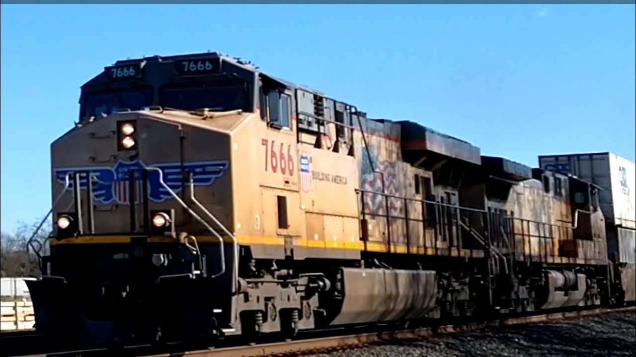 UP 7666 UP 5557 LEAD A NORTHBOUND INTERMODAL TRAIN WITH UP 2537 UP 2558 ...