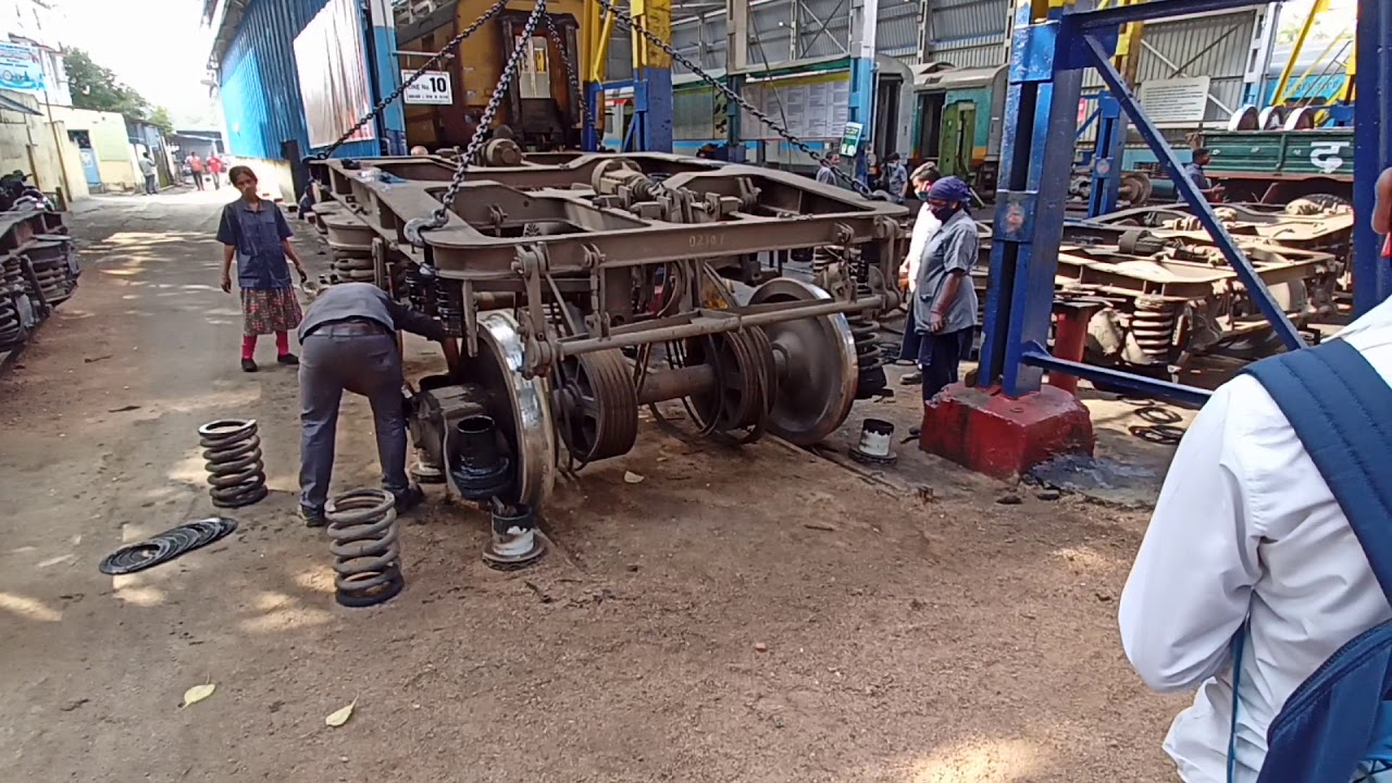 ICF bogie frame lifting and removing shims for sending it to workshop ...