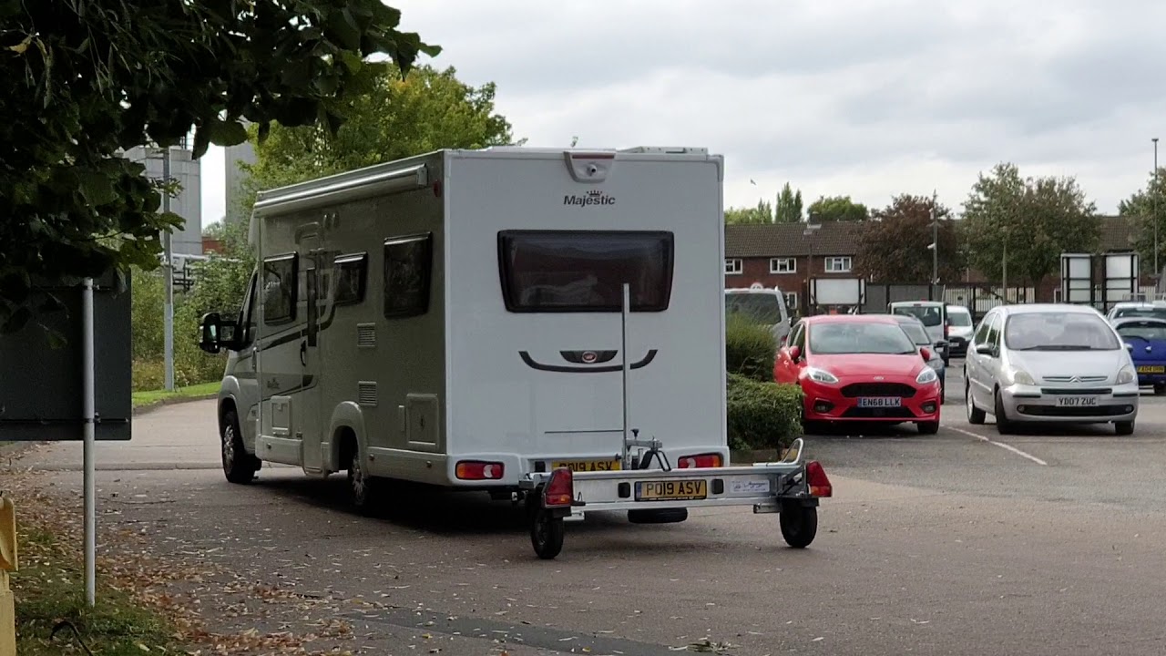 standard transverse motorbike trailer leaving - YouTube
