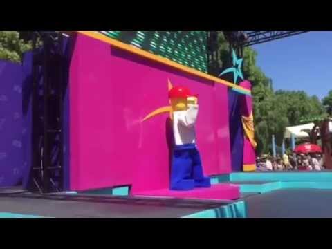 LEGO 2015: Lego man dancing on stage plus Geico ads up on the sky - YouTube