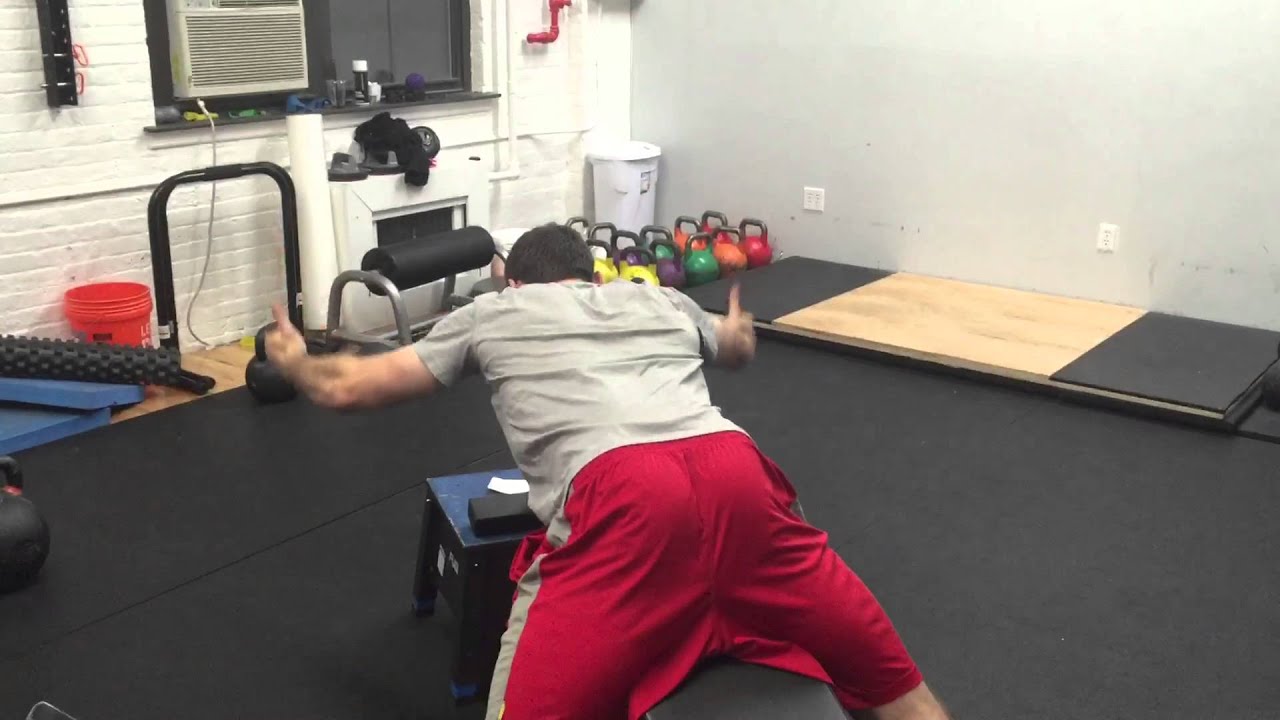 Prone Trap Raise on Incline Bench - YouTube