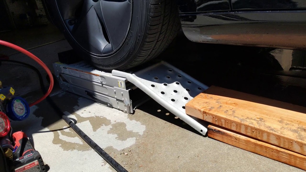 How to put your Tesla model 3 onto a car ramp without hitting the ...
