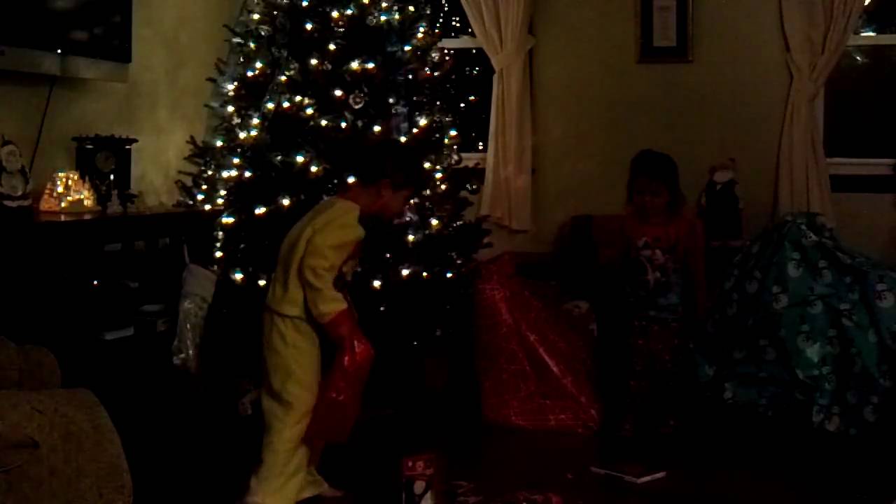 Caleb and Lillianna finding out what Santa left! - YouTube