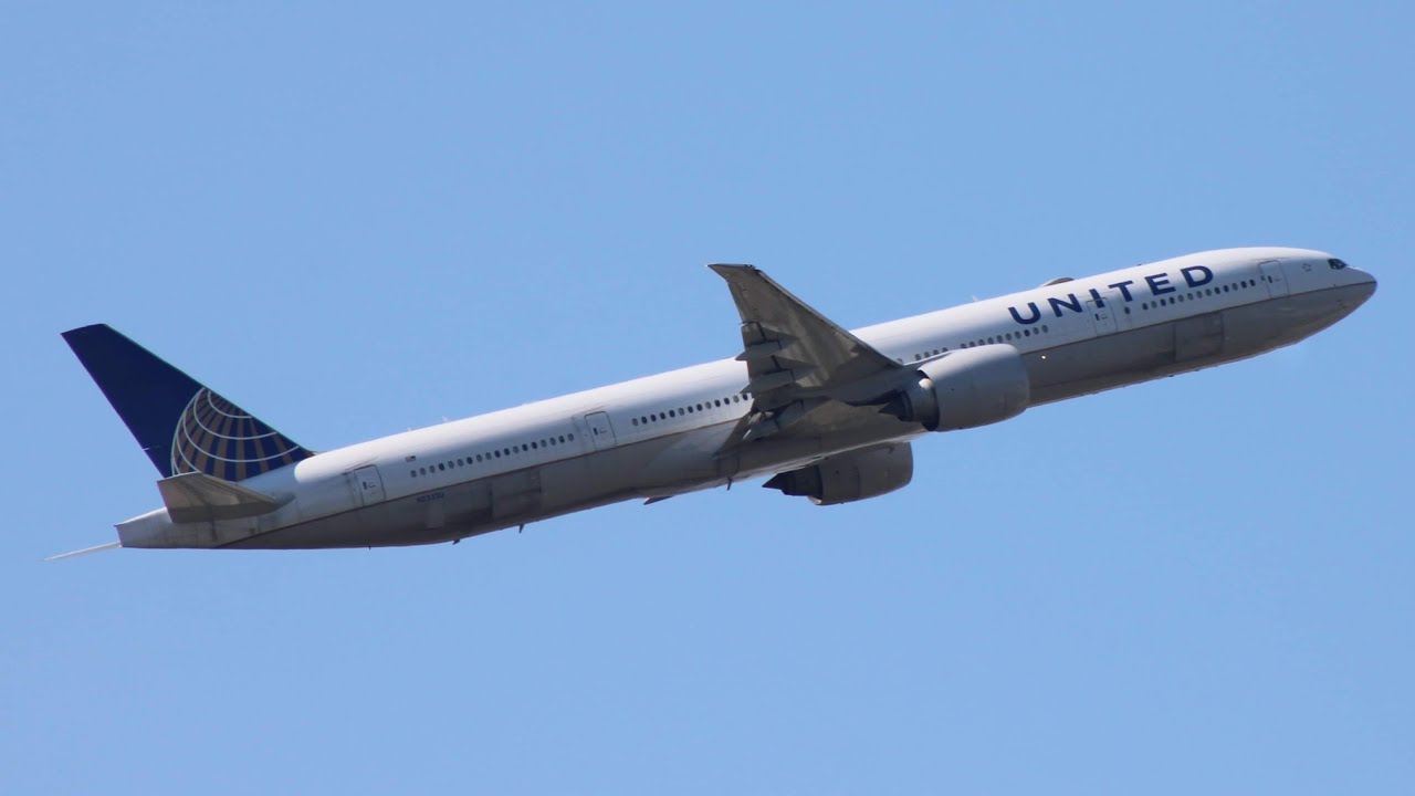 United Airlines Boeing 777-300ER (B77W) startup, taxi to runway 28, and ...