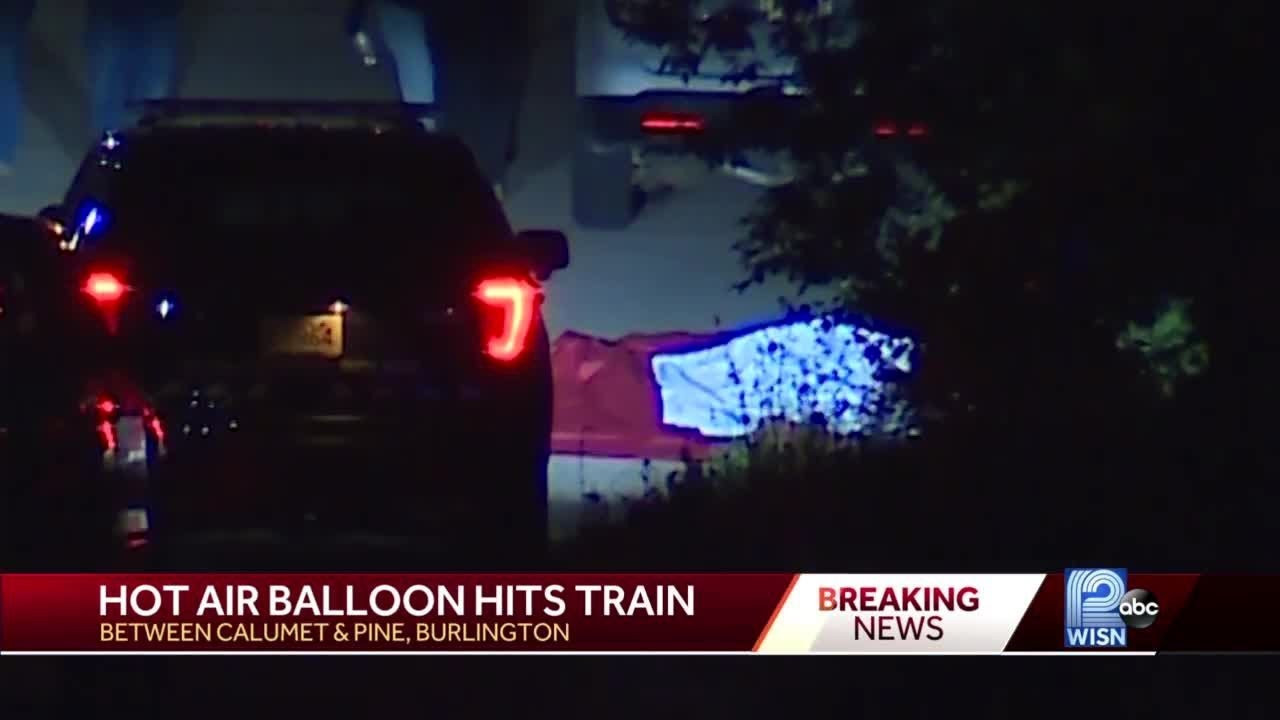 Hot air balloon crashes, hits train in Burlington - YouTube