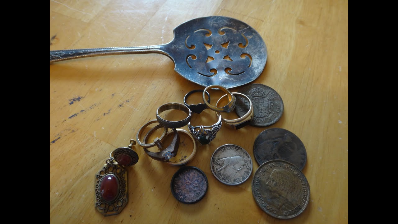 A pile of rings metal detecting Nova Scotia beach Da found most of it ...