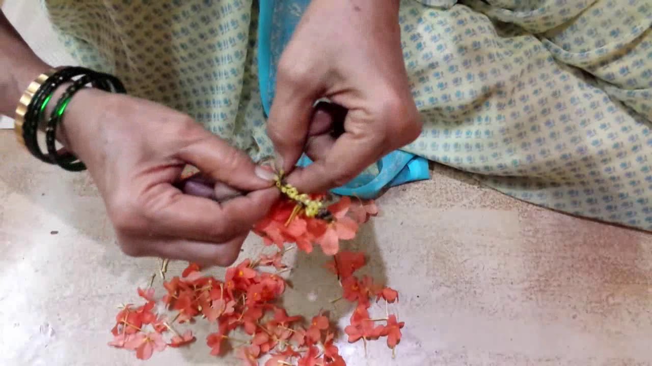 How to string kanakambaram flowers - YouTube