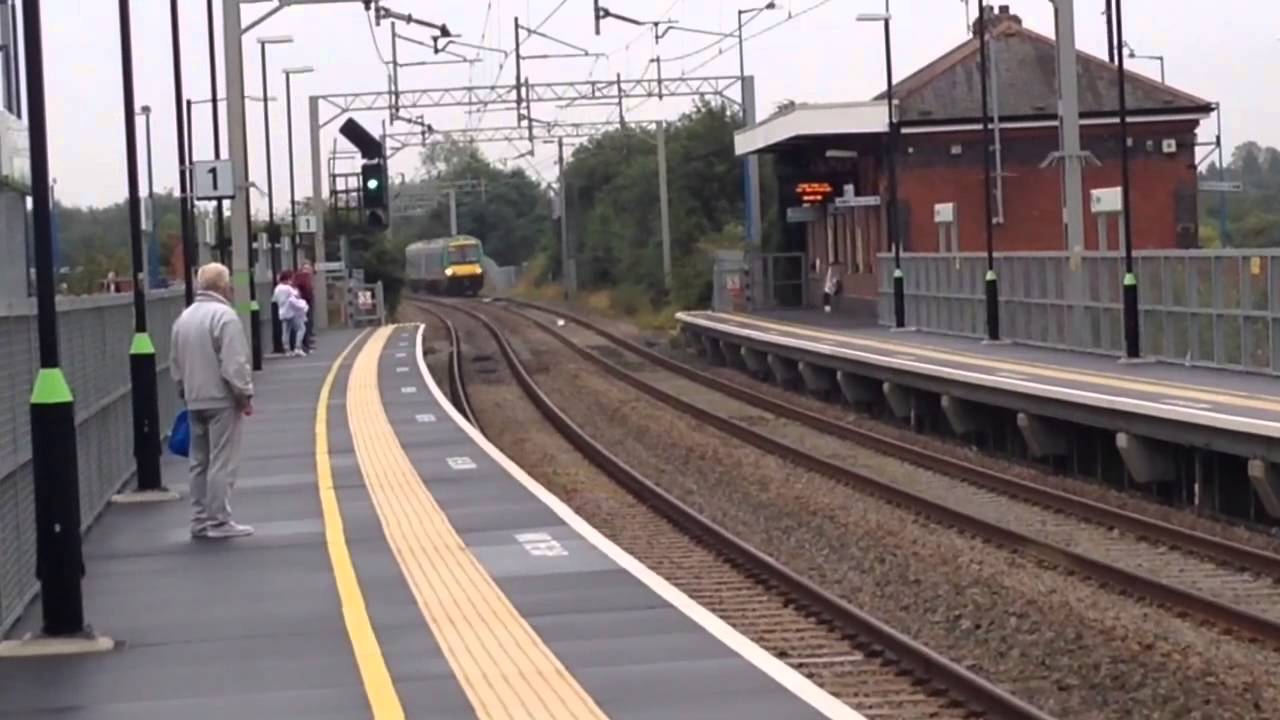 Trains passing through Tipton train station - YouTube