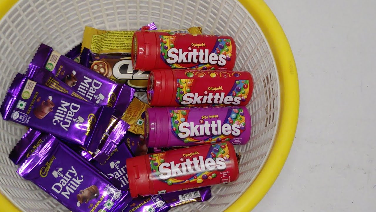 Very yummy skittles candies and Cadbury dairy milk chocolate - YouTube