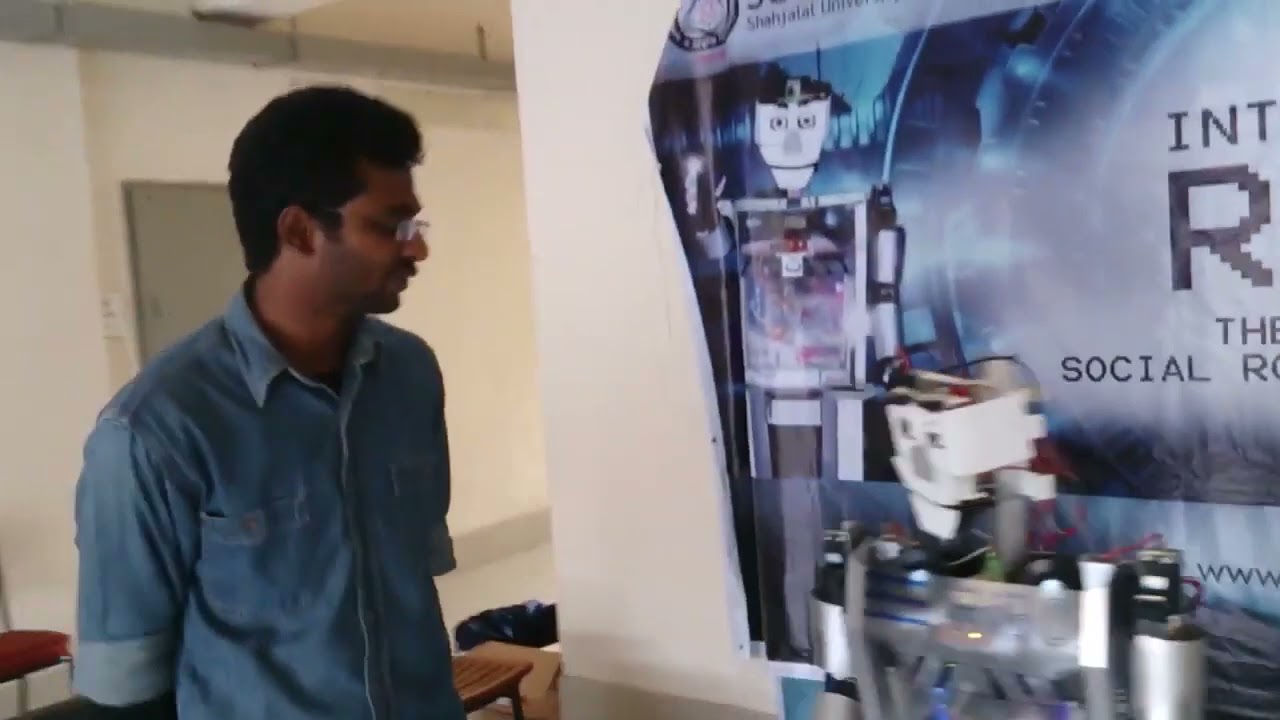 RIBO: a social humanoid robot - YouTube