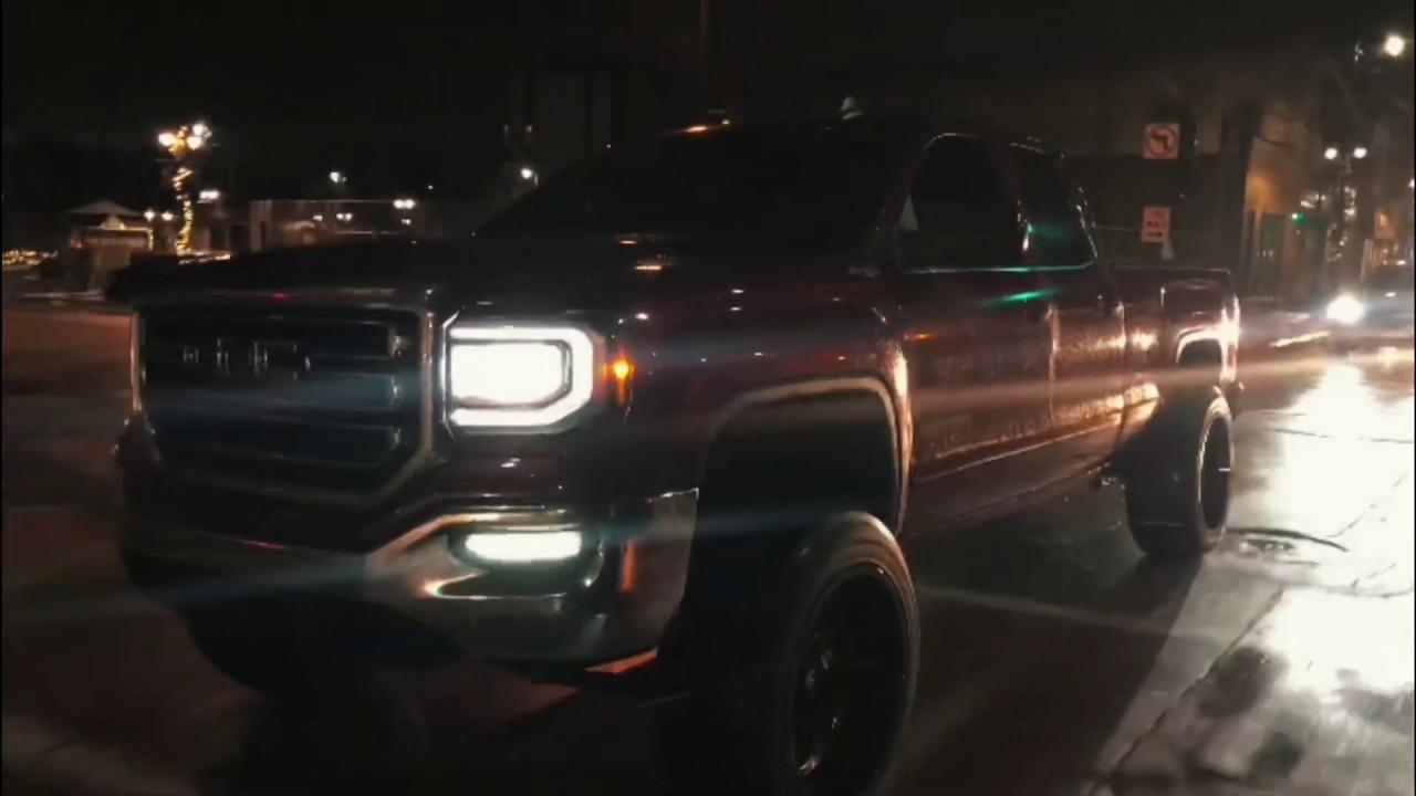 Squatted GMC gets new wheels! - YouTube