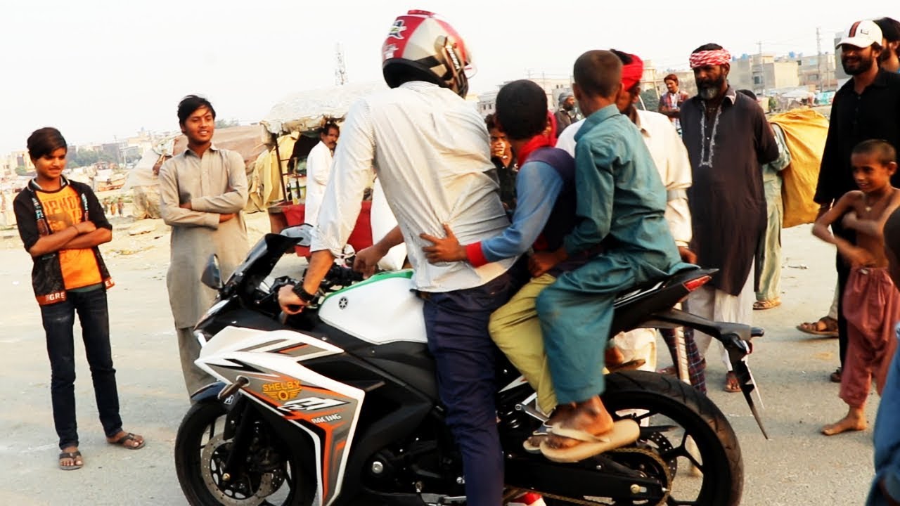 GIVING POOR PEOPLE RIDES ON A HEAVY BIKE - YouTube