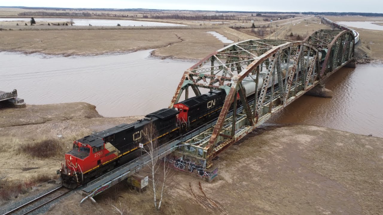 Awesome 4K Aerial View! Long Freight Train CN 507 Crossing Bridge at ...