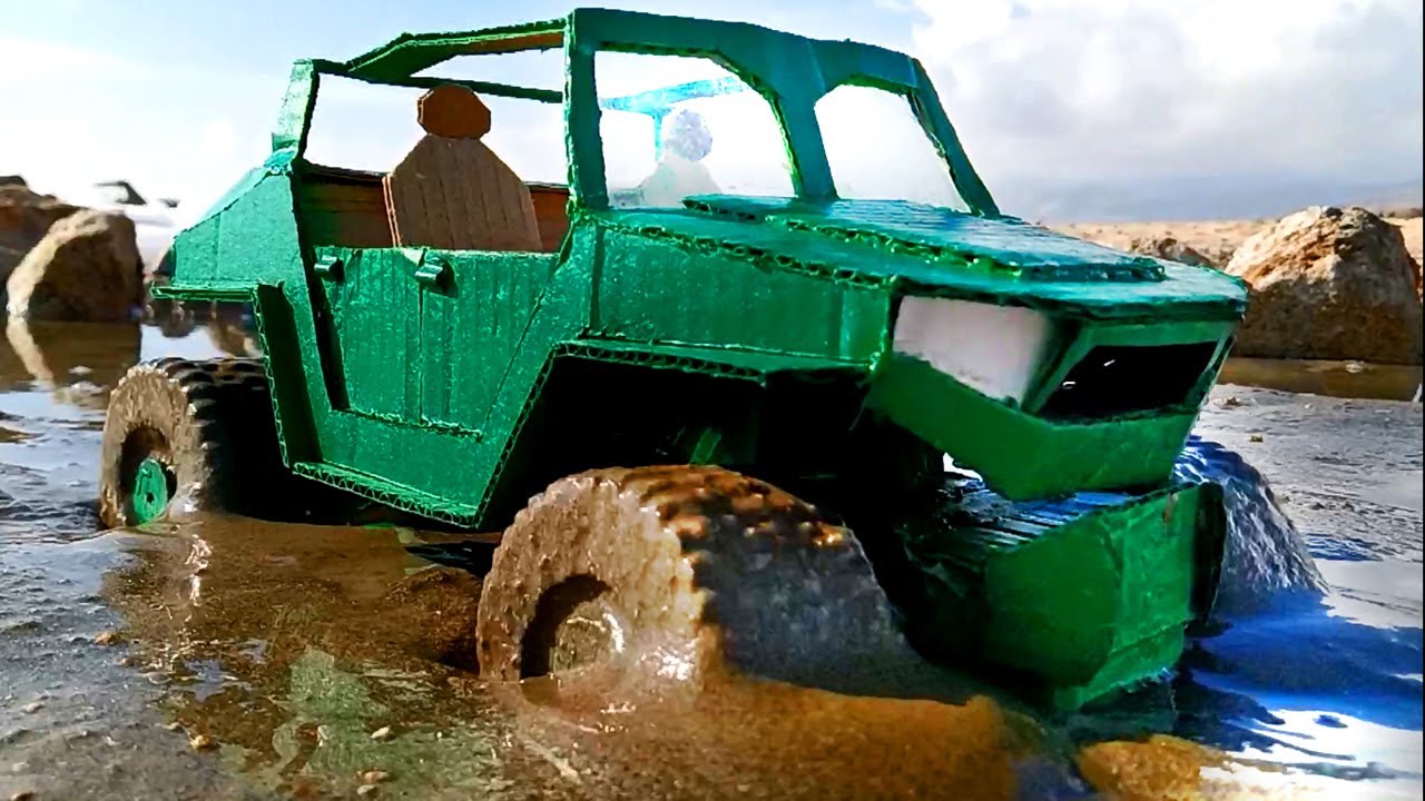 Homemade cardboard RC buggy type car conquers water and mud - YouTube