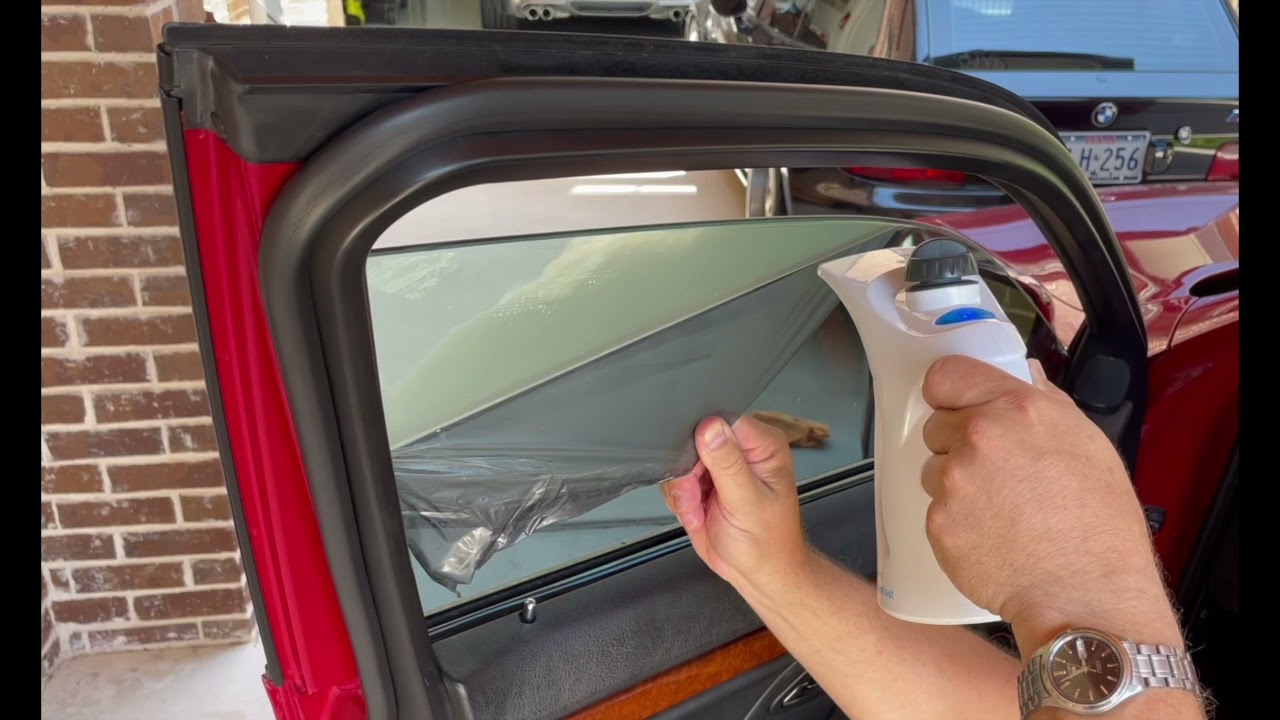 Removing old window tint with steamer - YouTube