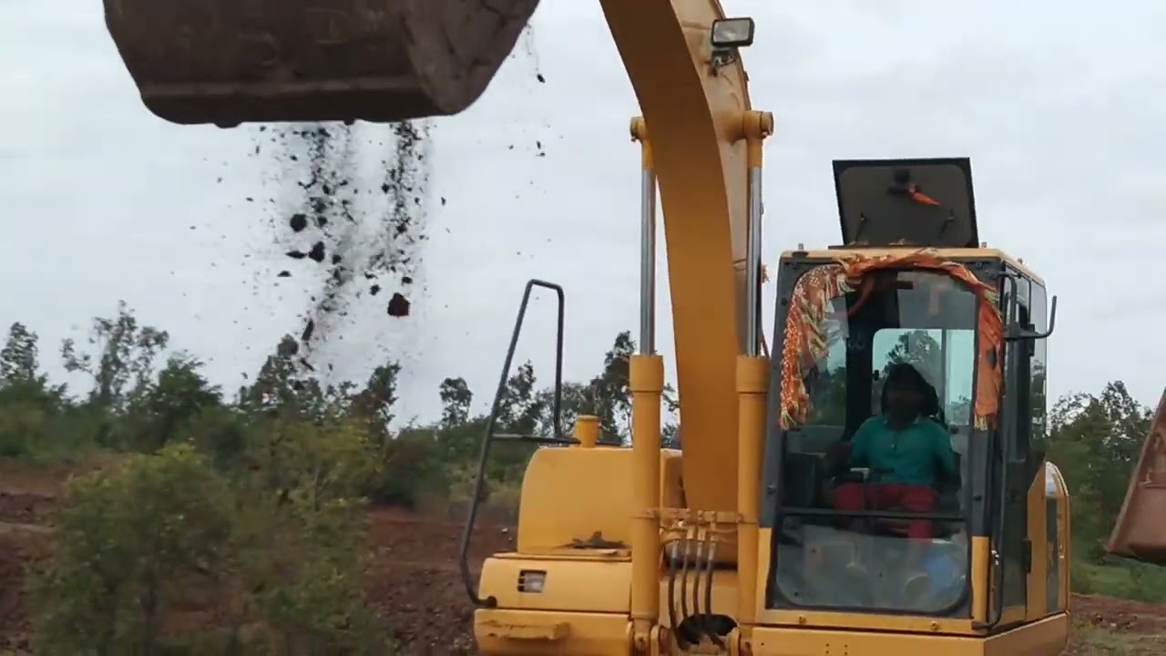loading work using excavator #shorts - YouTube