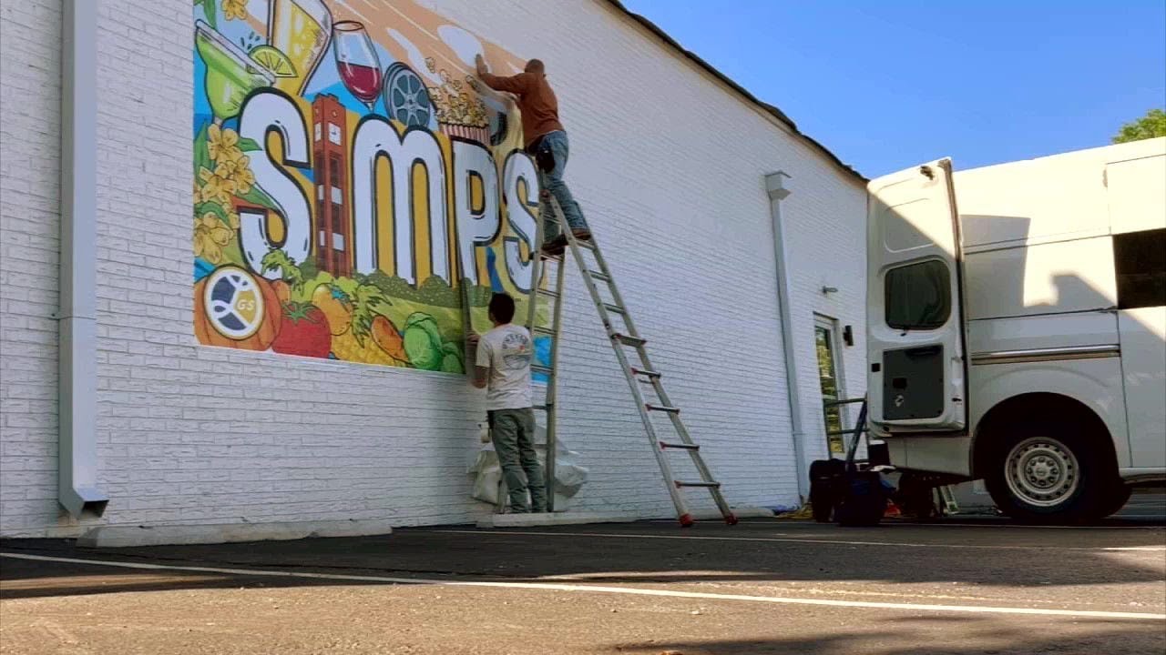Laminate murals offer an alternative to hand-painted public art - YouTube