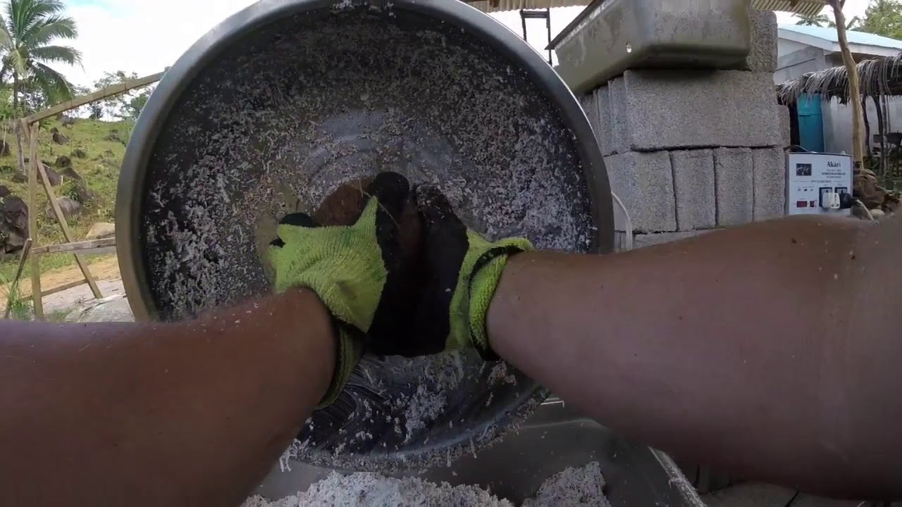 Let's see how well this Filipino coconut shredder works! - YouTube