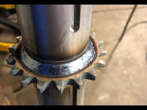 Welding hardened sprocket to shaft with dual shield - YouTube