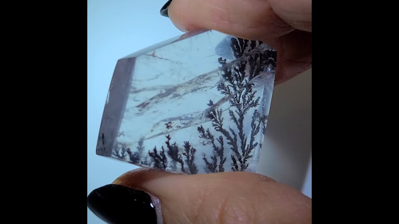Dendritic in quartz specimen with rainbows on both sides and amazing ...