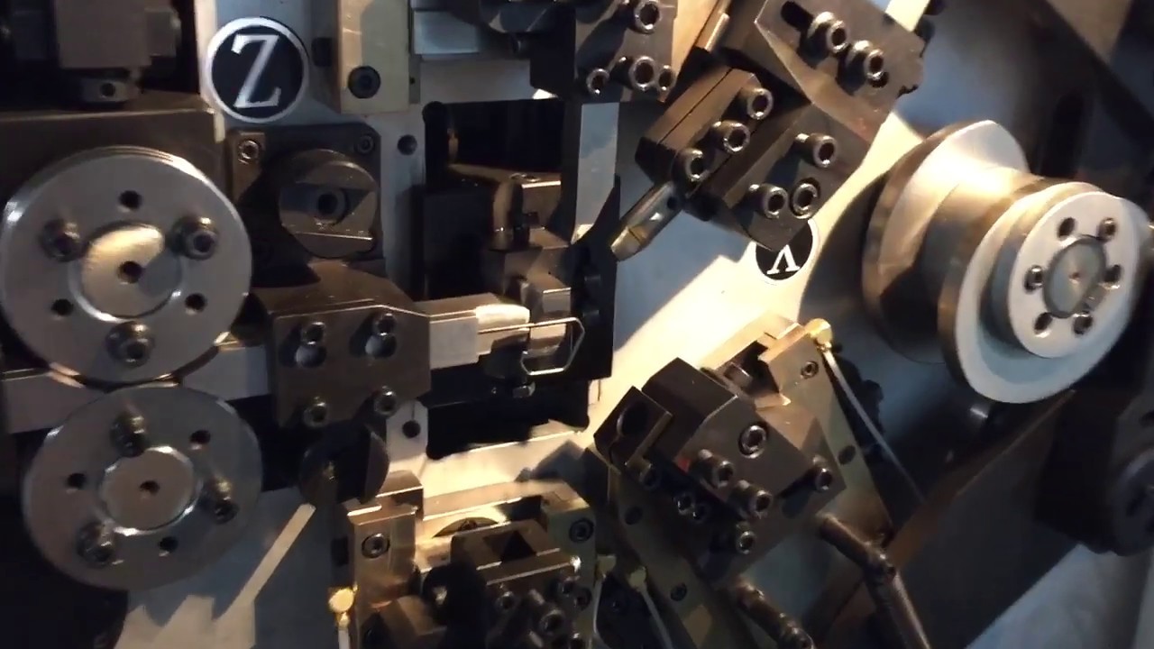 WNJ TK550 Spring Coiling Machine of Straight Cut Video - YouTube