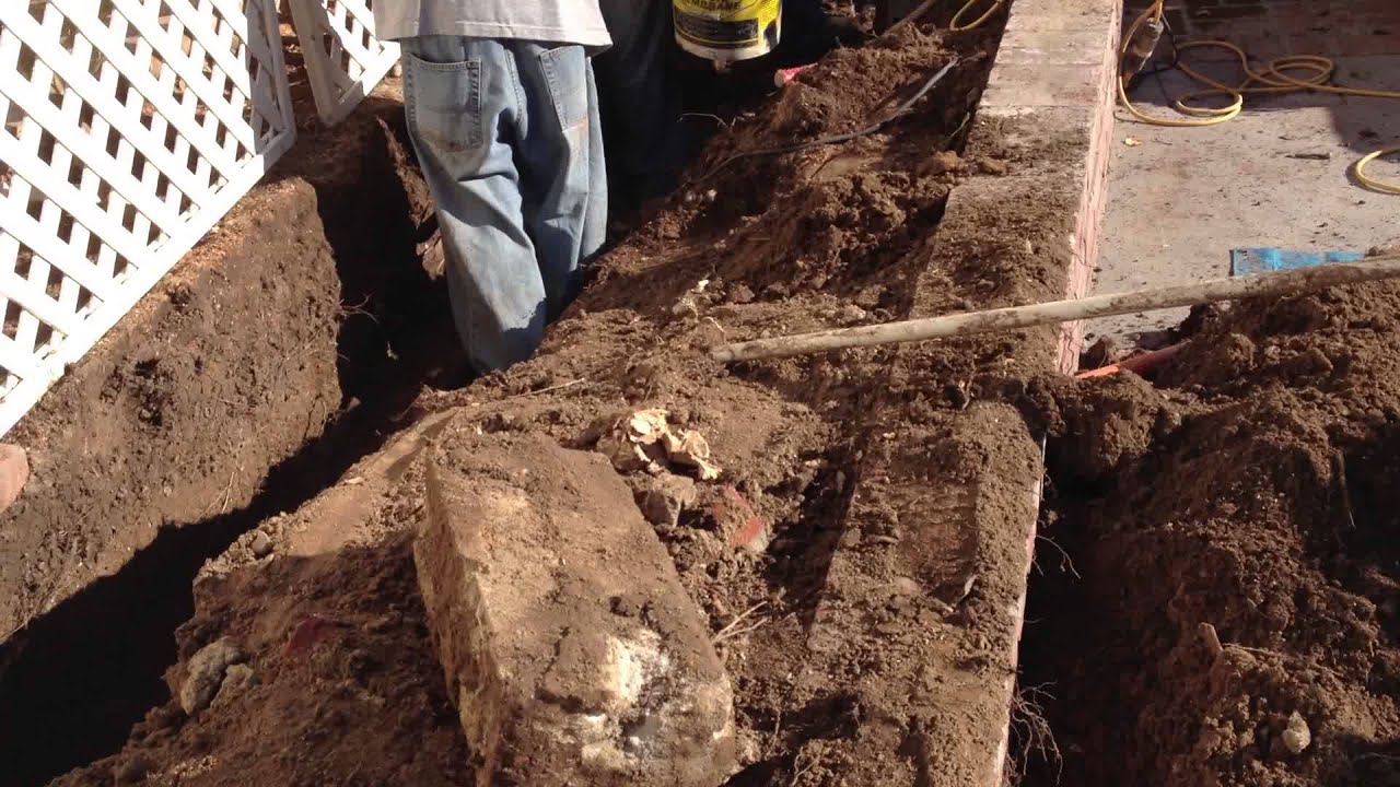 How to Dig a Trench for New Block Wall Installation Shafran ...