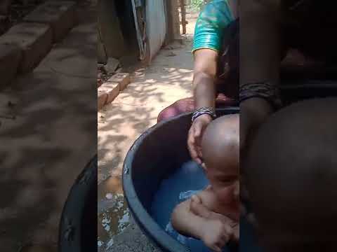 Grandma baby bathing 7 months baby