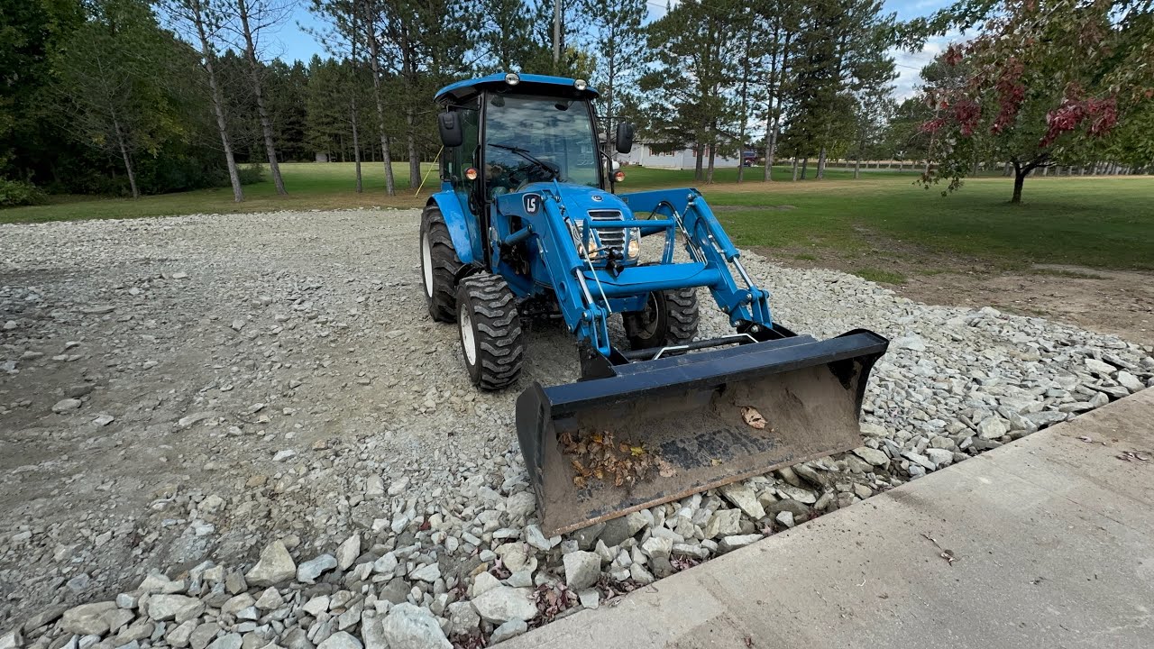 Short video Ls tractor moving rocks - YouTube