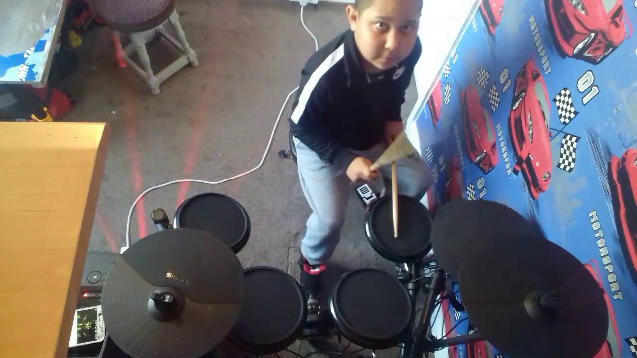 Me playing on the drums - YouTube