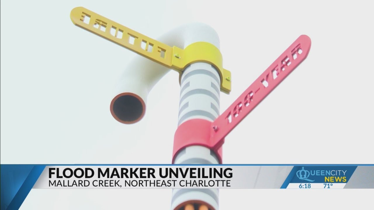 County officials tap local artists for Charlotte flood marker - YouTube