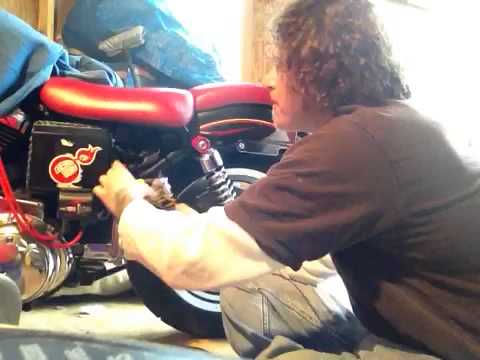 Custom key on Harley fuse cover... - YouTube