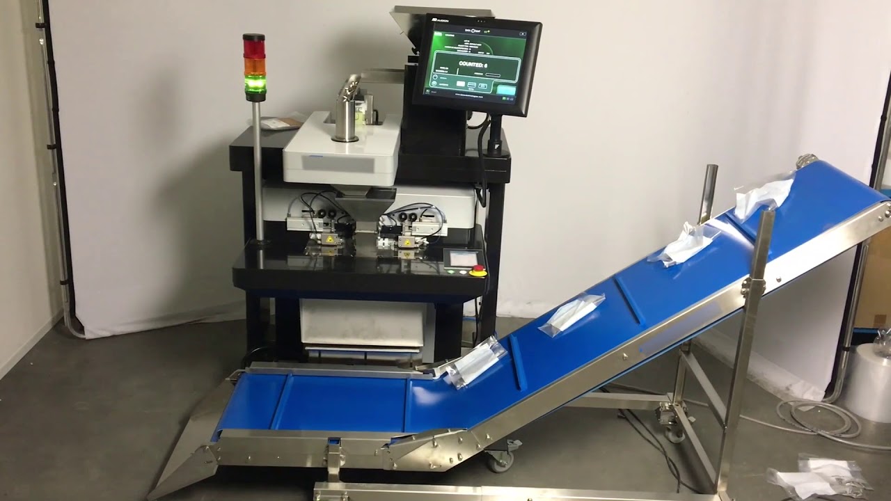 Rollbag R3200 Automatic Bagger with Vision Counter - shown bagging ...