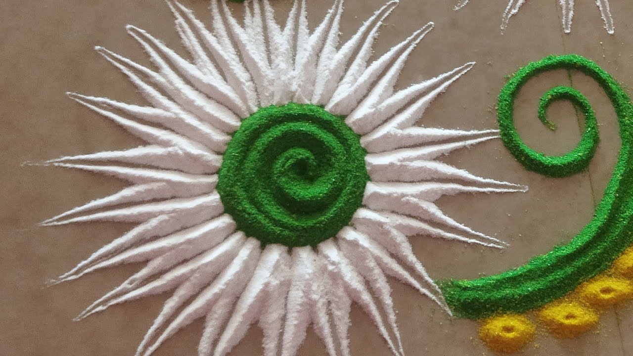 Beautiful flower rangoli design. Attractive flowers design. satisfying ...