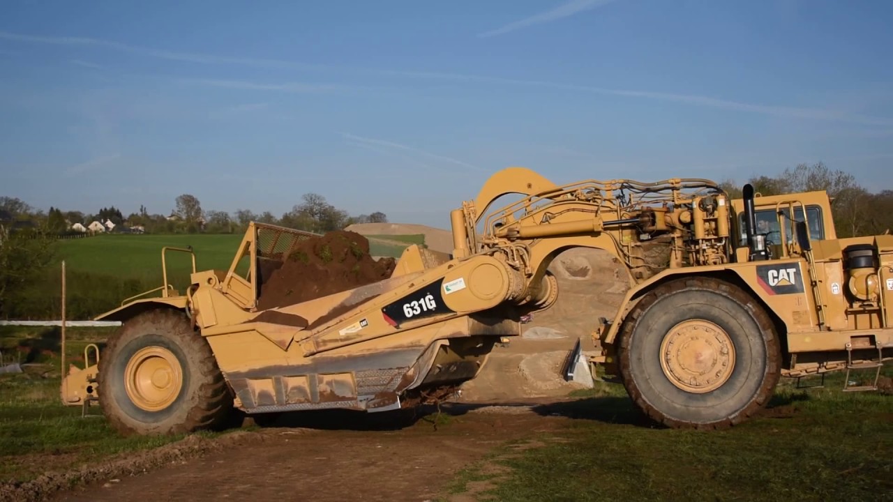 Caterpillar D10T and 631G - YouTube