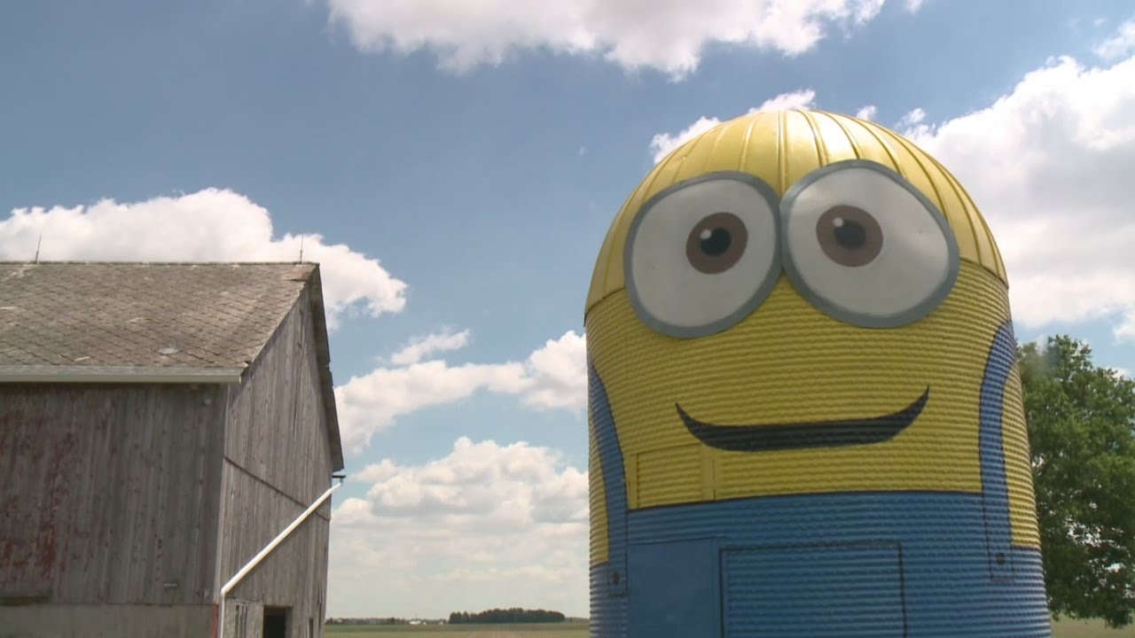 Family turns farm silo into giant Minion - YouTube