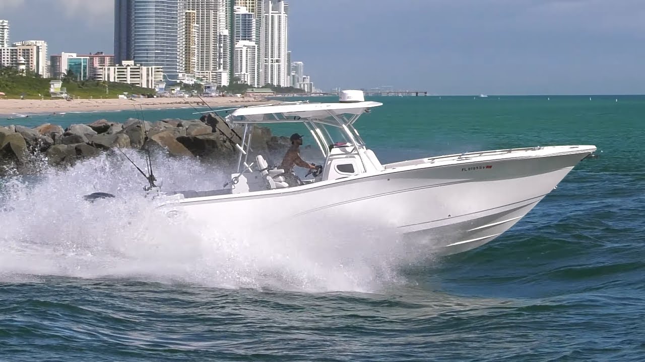 Boats Arriving And Leaving From Haulover Inlet Near Miami Beach Florida ...