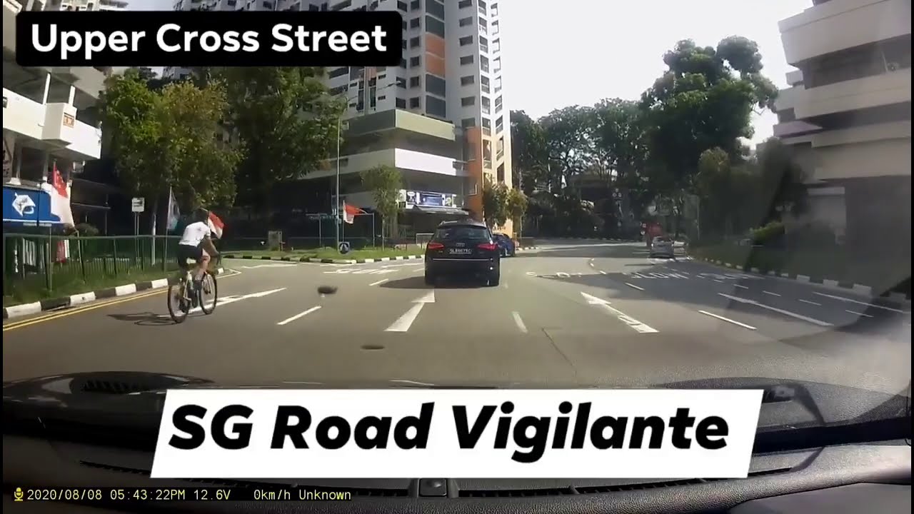 8aug2020 upper cross street cyclist recklessly beating red light almost ...