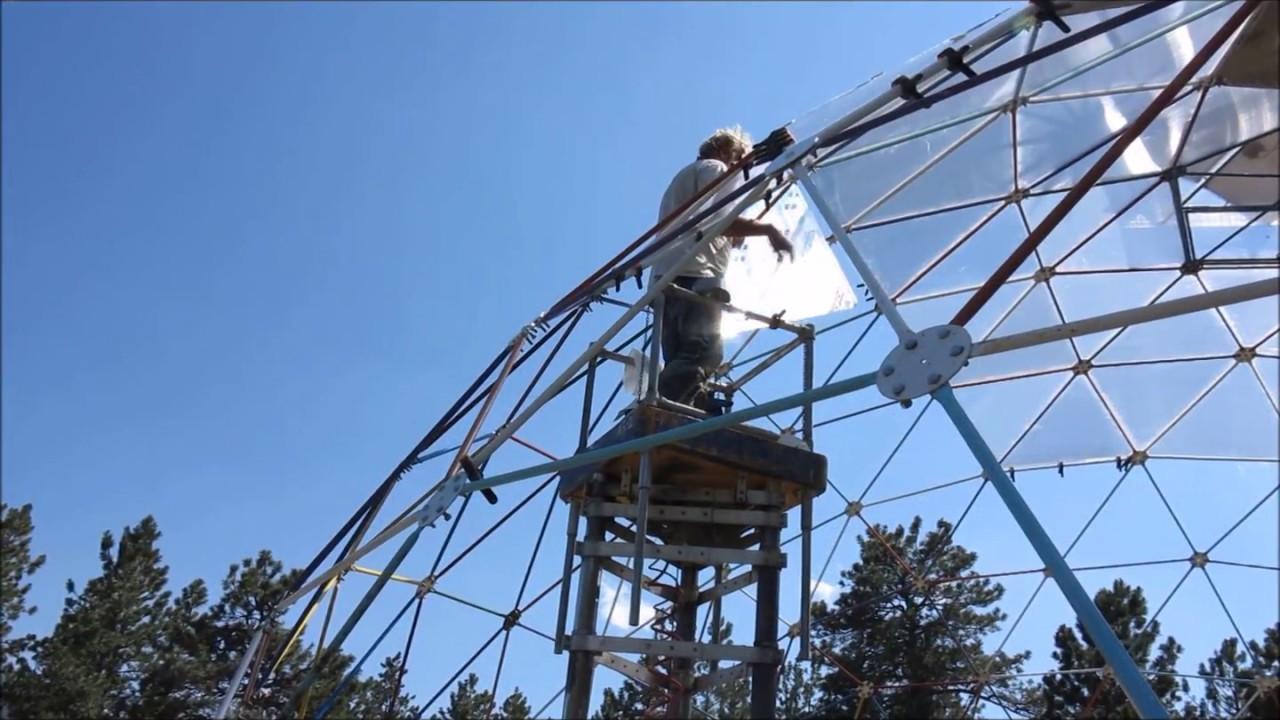 Lexan installation on Geothermal Geodesic Dome - YouTube