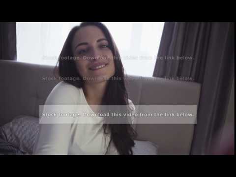 Attractive teen girl is making faces and smiling for a selfie picture