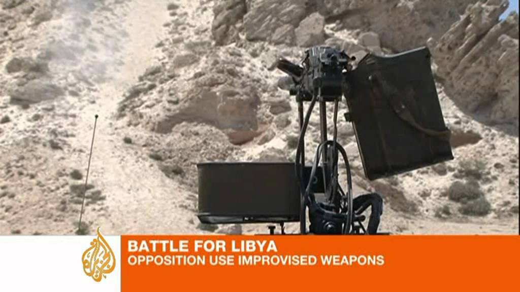 Libya rebels make weapons from scraps - YouTube