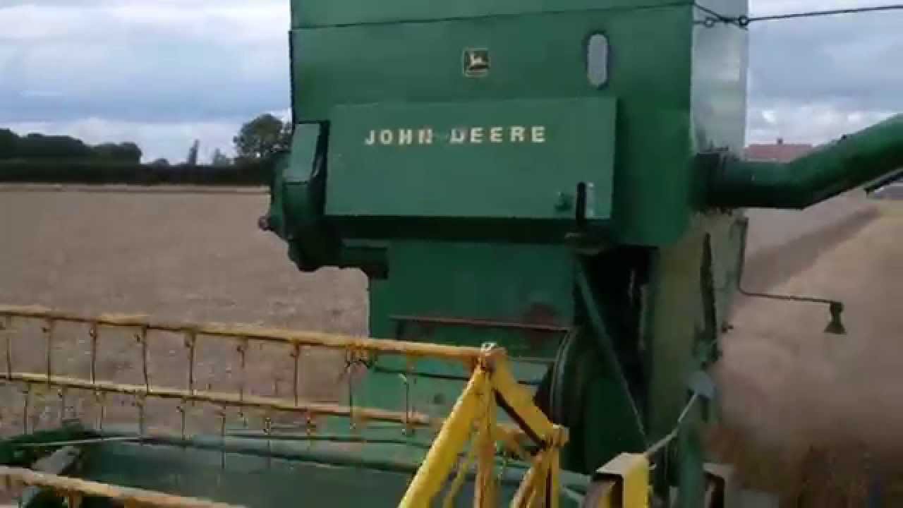 John Deere 360 trailed combine harvester. - YouTube