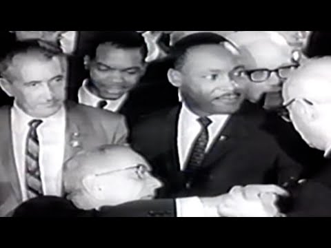President Lyndon B. Johnson signs Civil Rights Act of 1964 with Martin ...