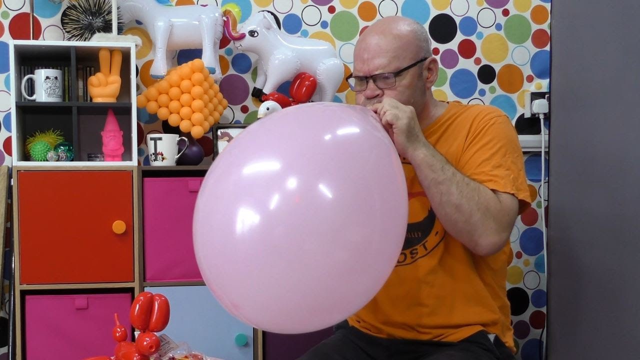 Angry man Blow to pop pink balloon Tangobaldy™ Family Friendly Fun ...
