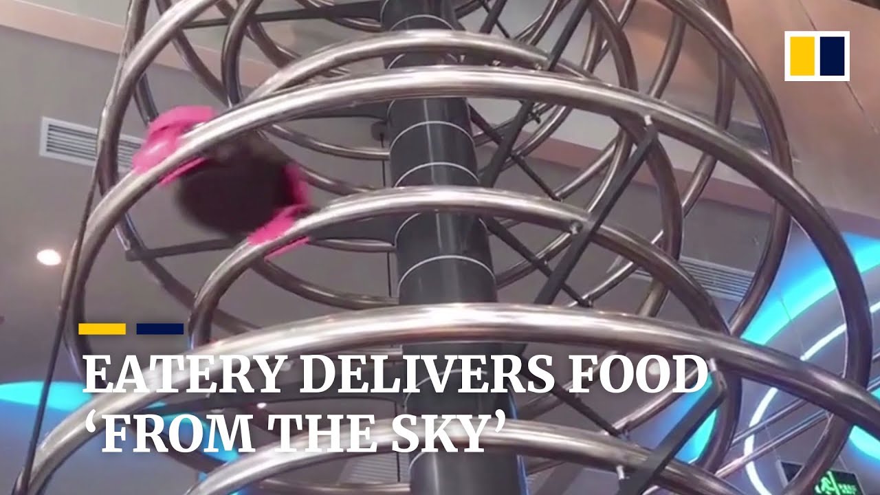 Restaurant uses spiral slides to deliver food to diners in China - YouTube