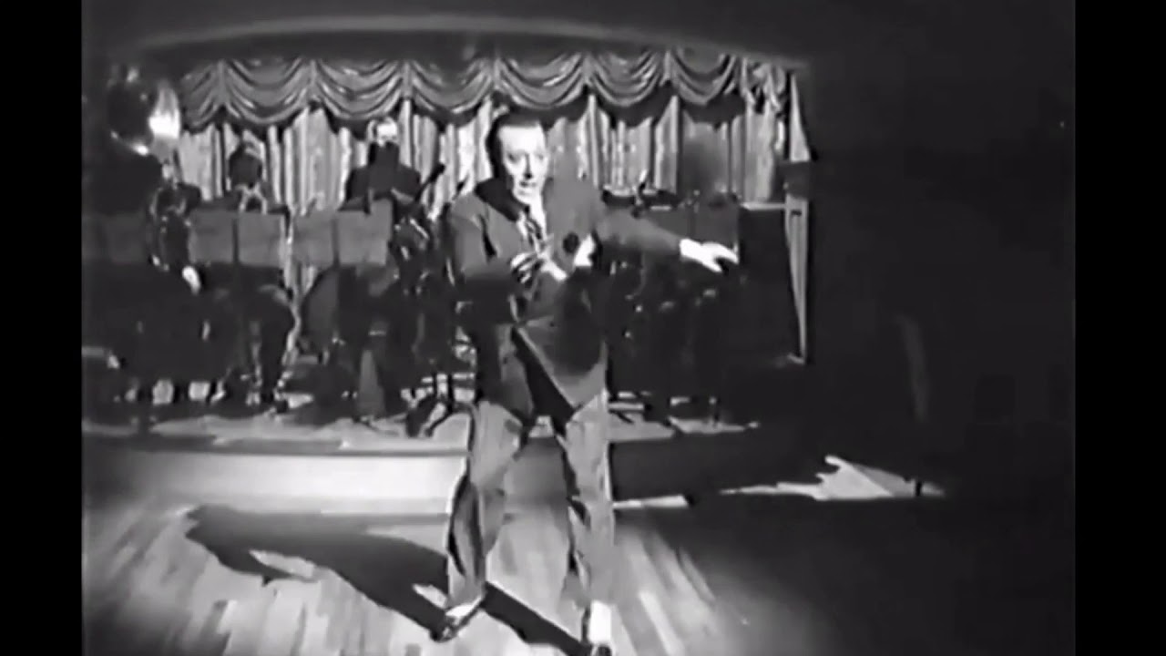 George Raft dancing to the chicken dance. - YouTube
