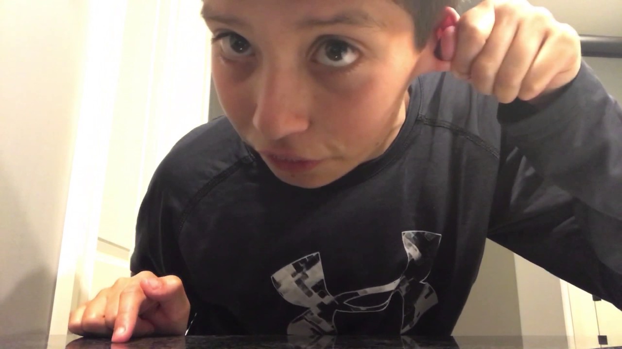 Finger through the ear trick - YouTube